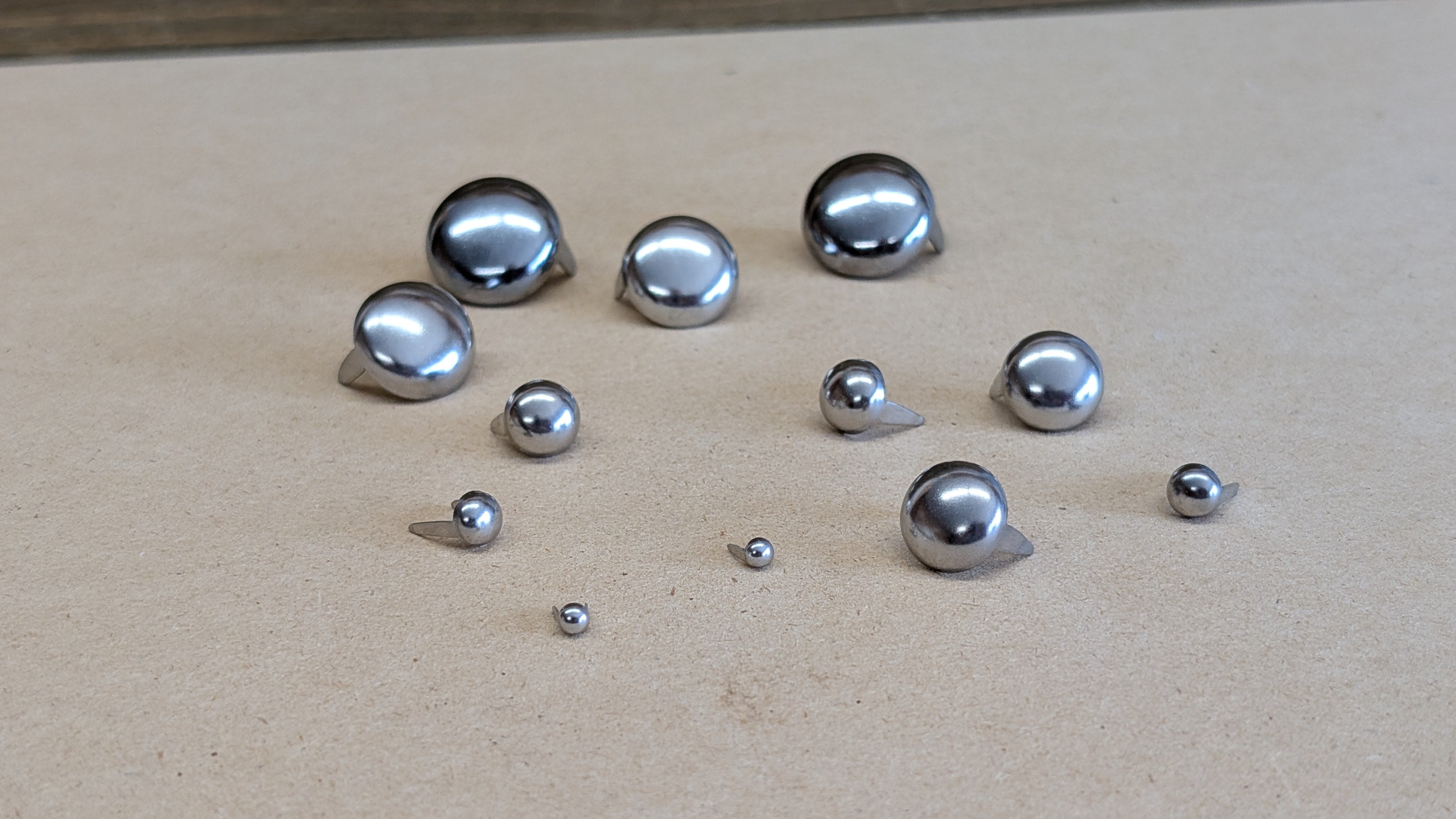Nickel Spots – Warkov-Safeer Leather Ltd.